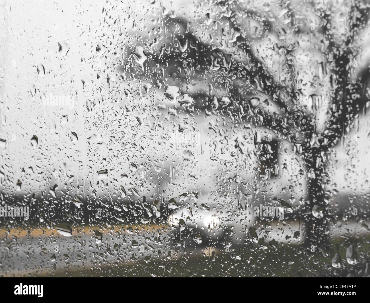 Bad weather driving on a way. Rain road Stock Photo - Alamy