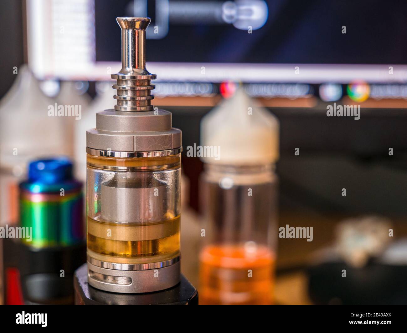 Filled electronic cigarette atomizer for vaping on top of the ...