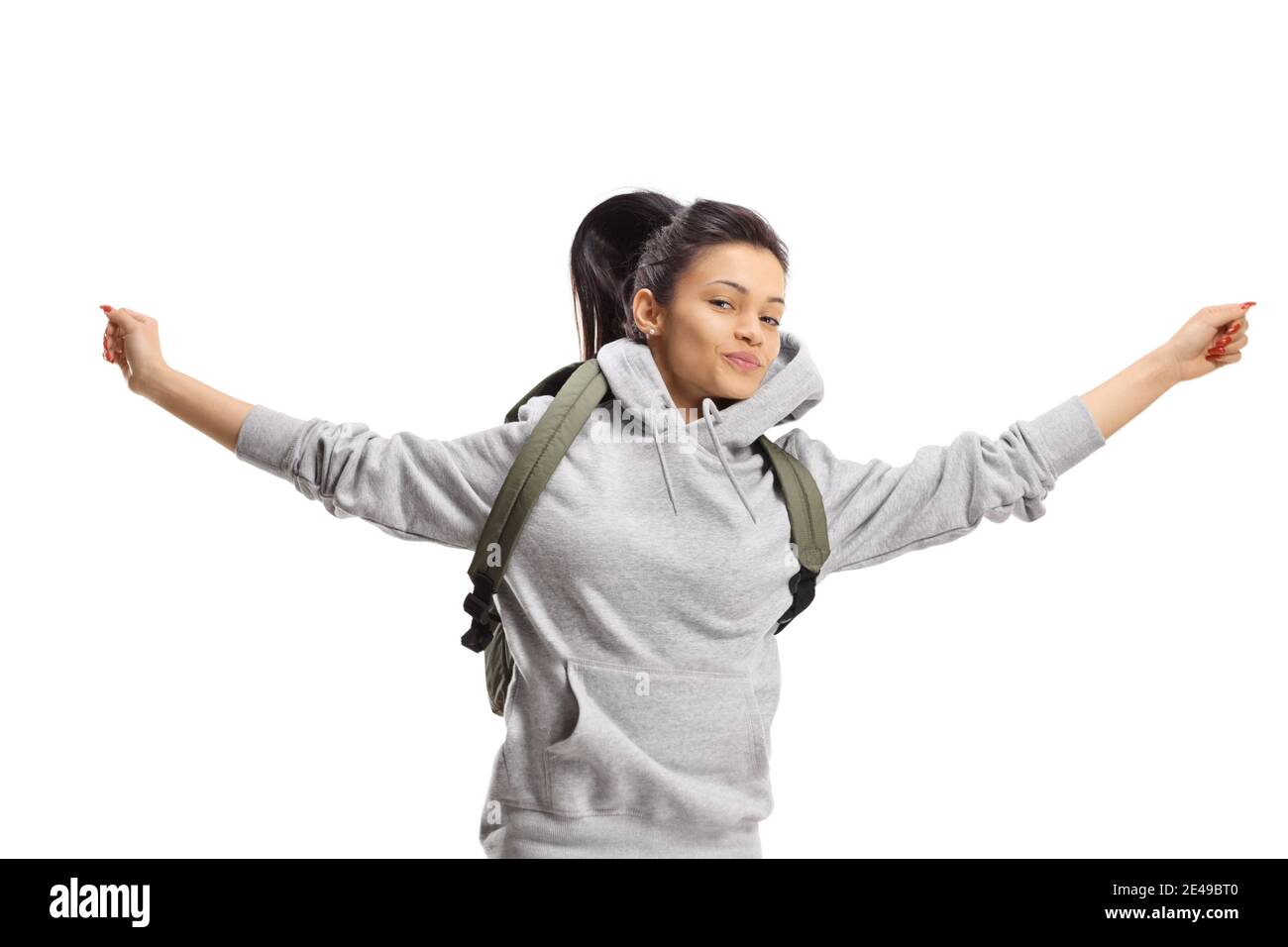 Happy female student with backpack jumping isolated on white background ...