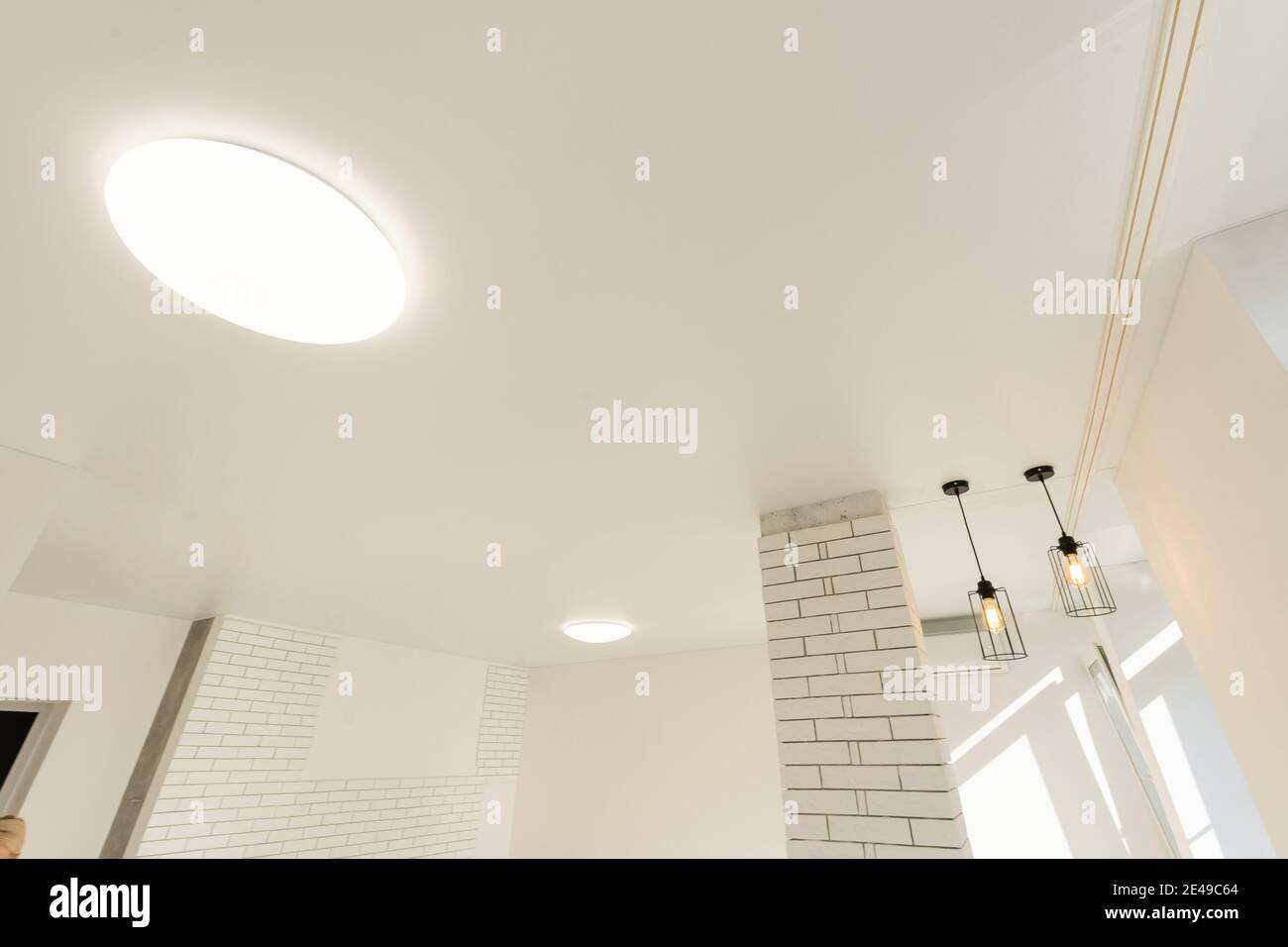 Beautiful built-in lamps in the stretch ceiling Stock Photo - Alamy