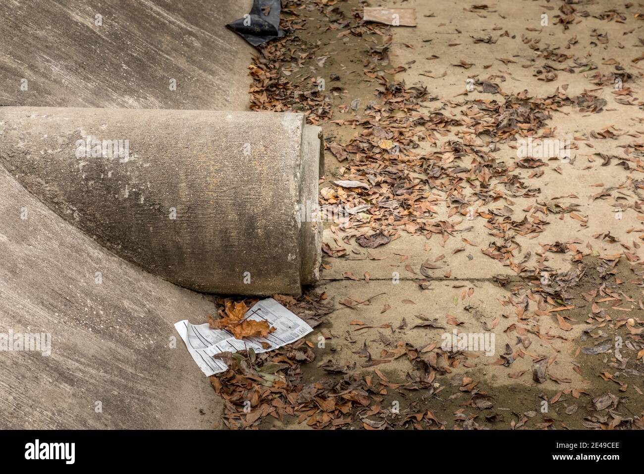 Concrete sewerage pipe system with debris and leaves Stock Photo - Alamy