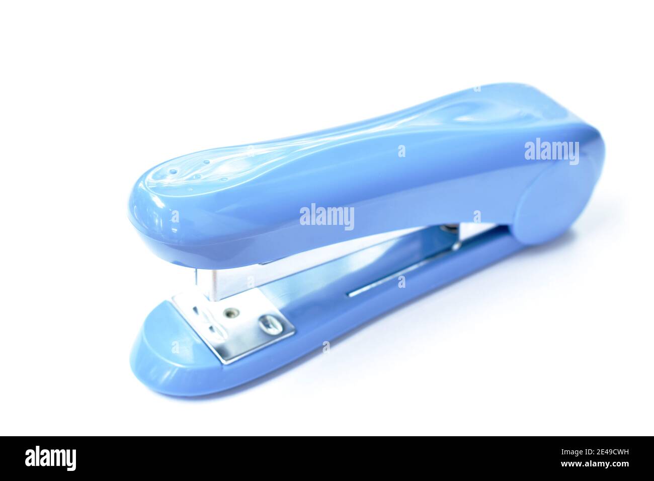 big blue stapler for pushing paper on white background Stock Photo - Alamy