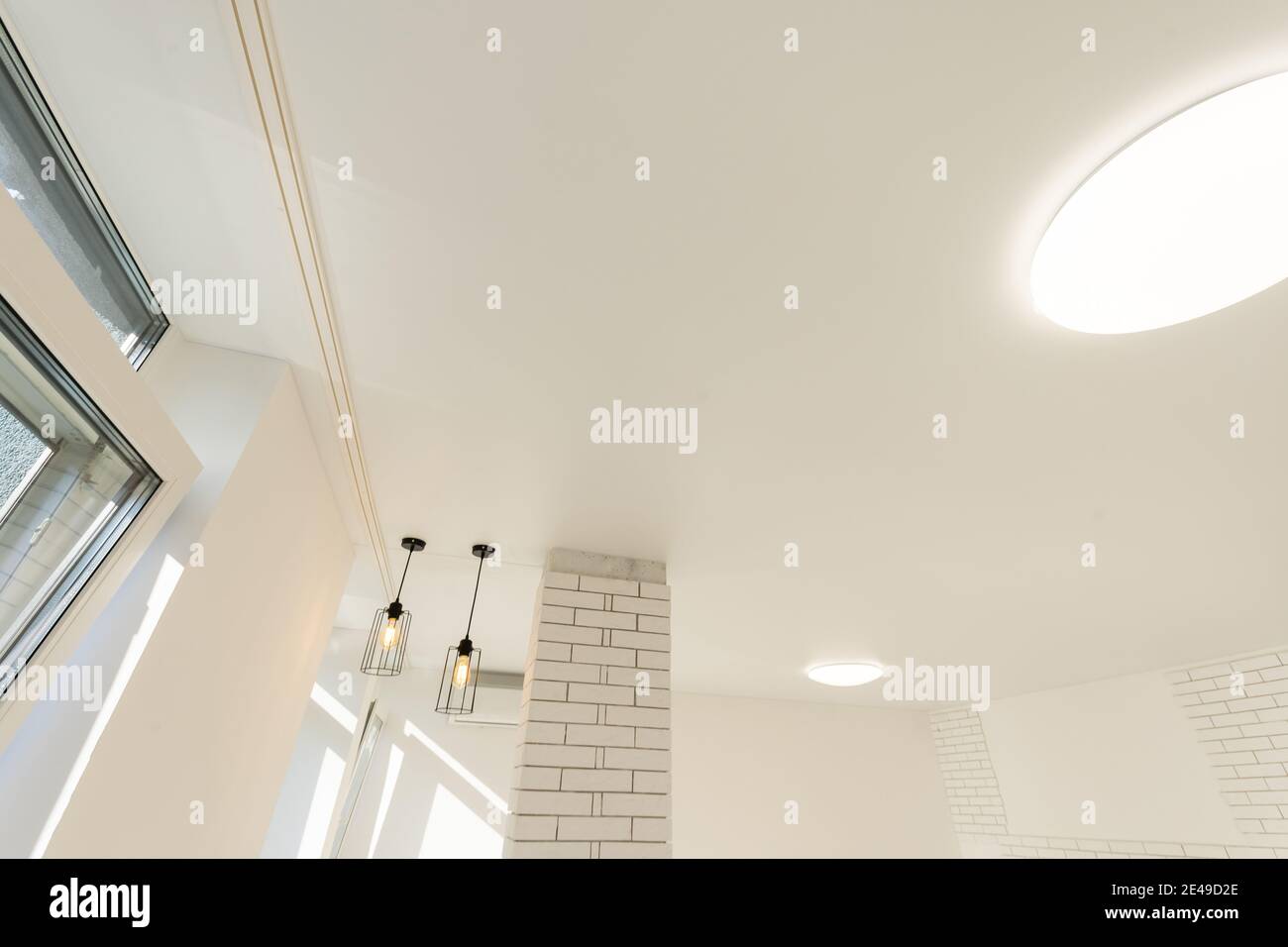 Beautiful built-in lamps in the stretch ceiling Stock Photo - Alamy