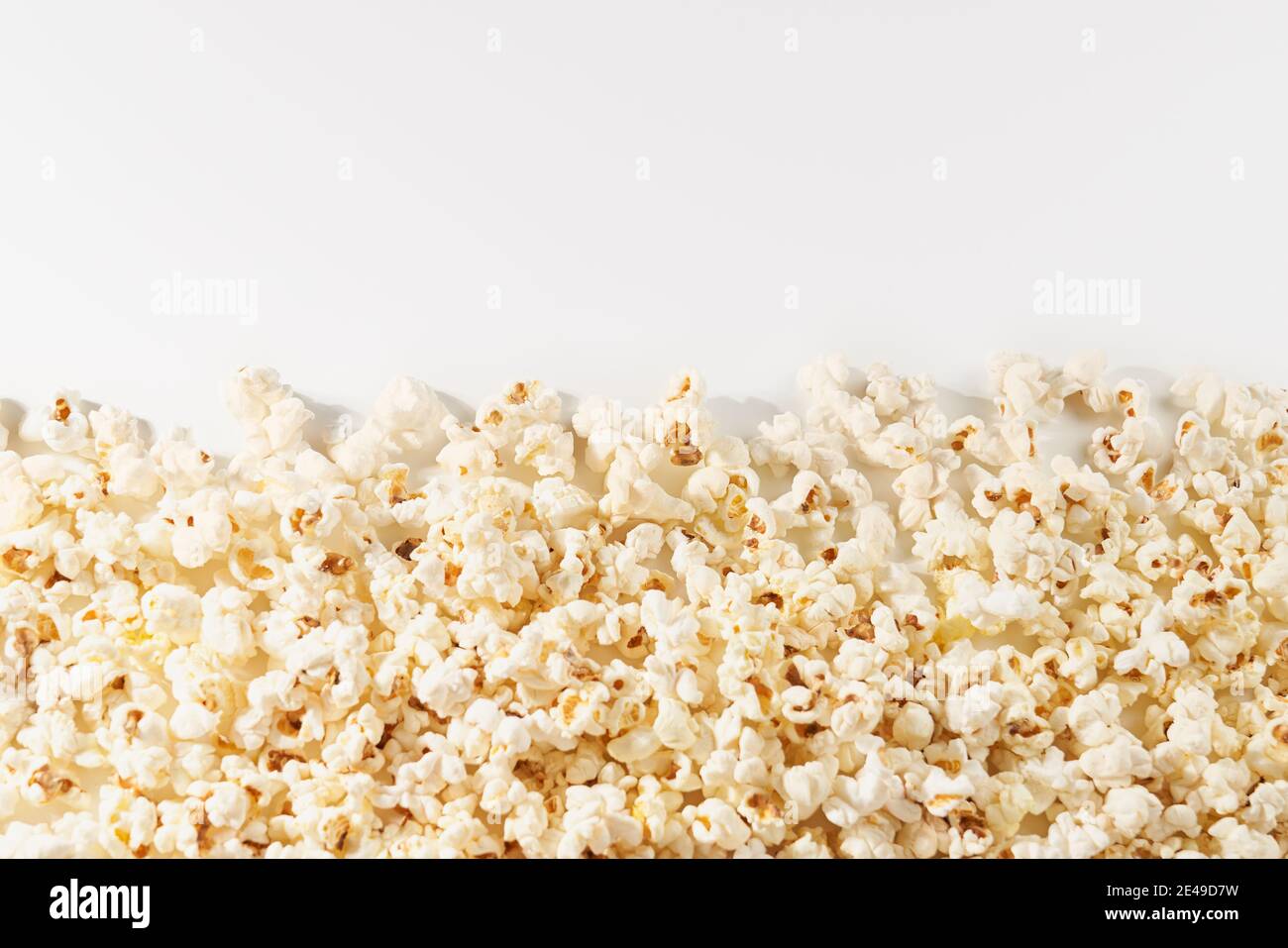 Fresh popcorn on white plate with clipping path. Concept of food Stock ...