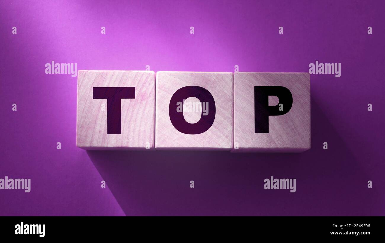 TOP Word Written In Wooden Cube. TOP text concept. cube wooden block.s ...