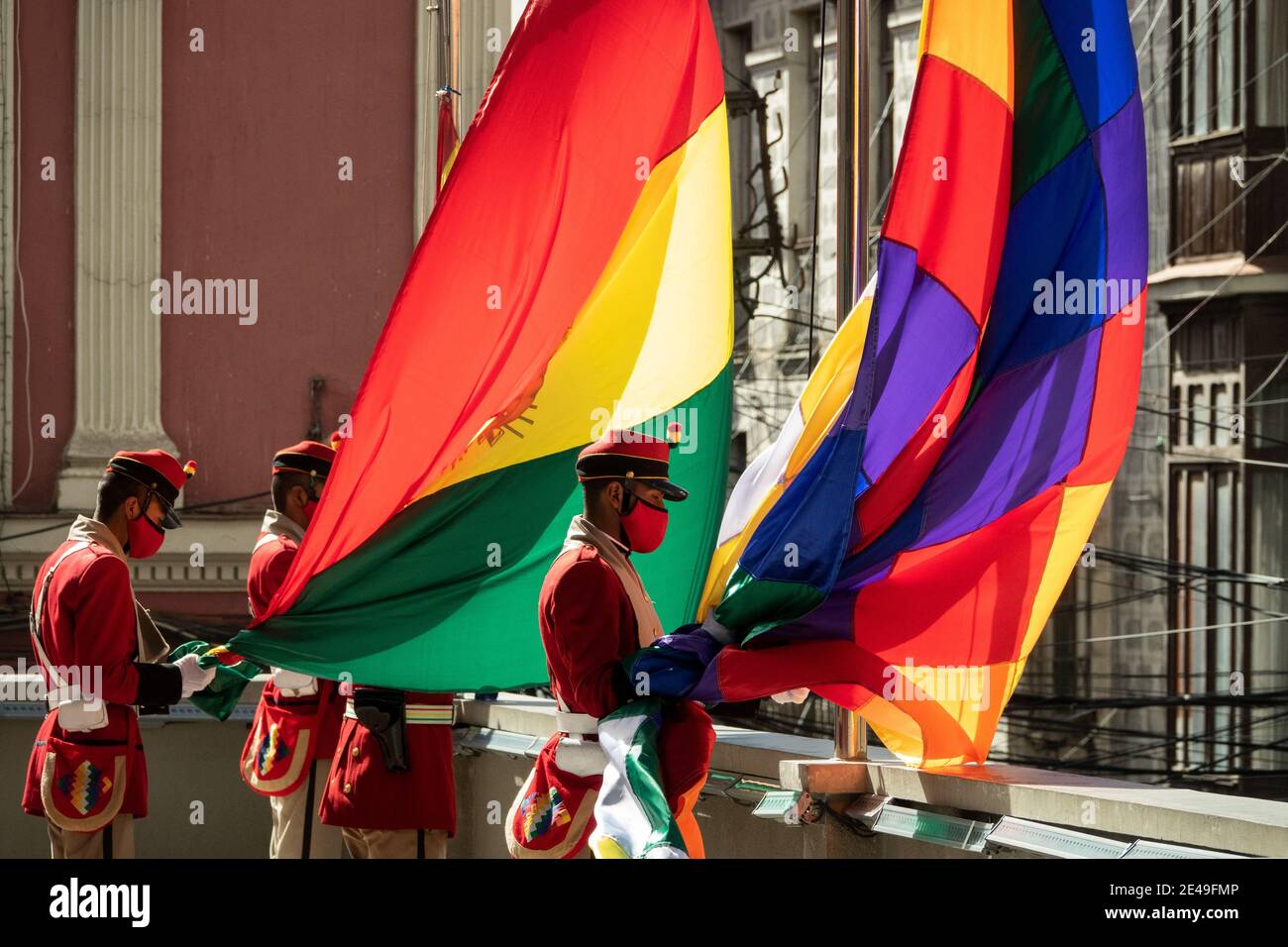 La Paz, Bolivia. 22nd Jan, 2021. Members of a guard raise flags during ...