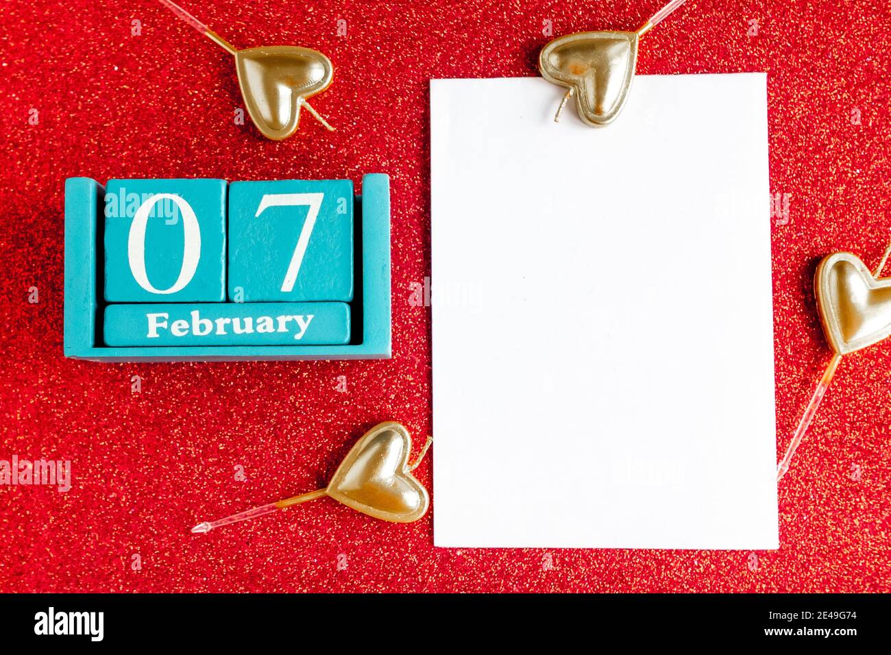 February 7. Blue cube calendar with month and date and white mockup ...