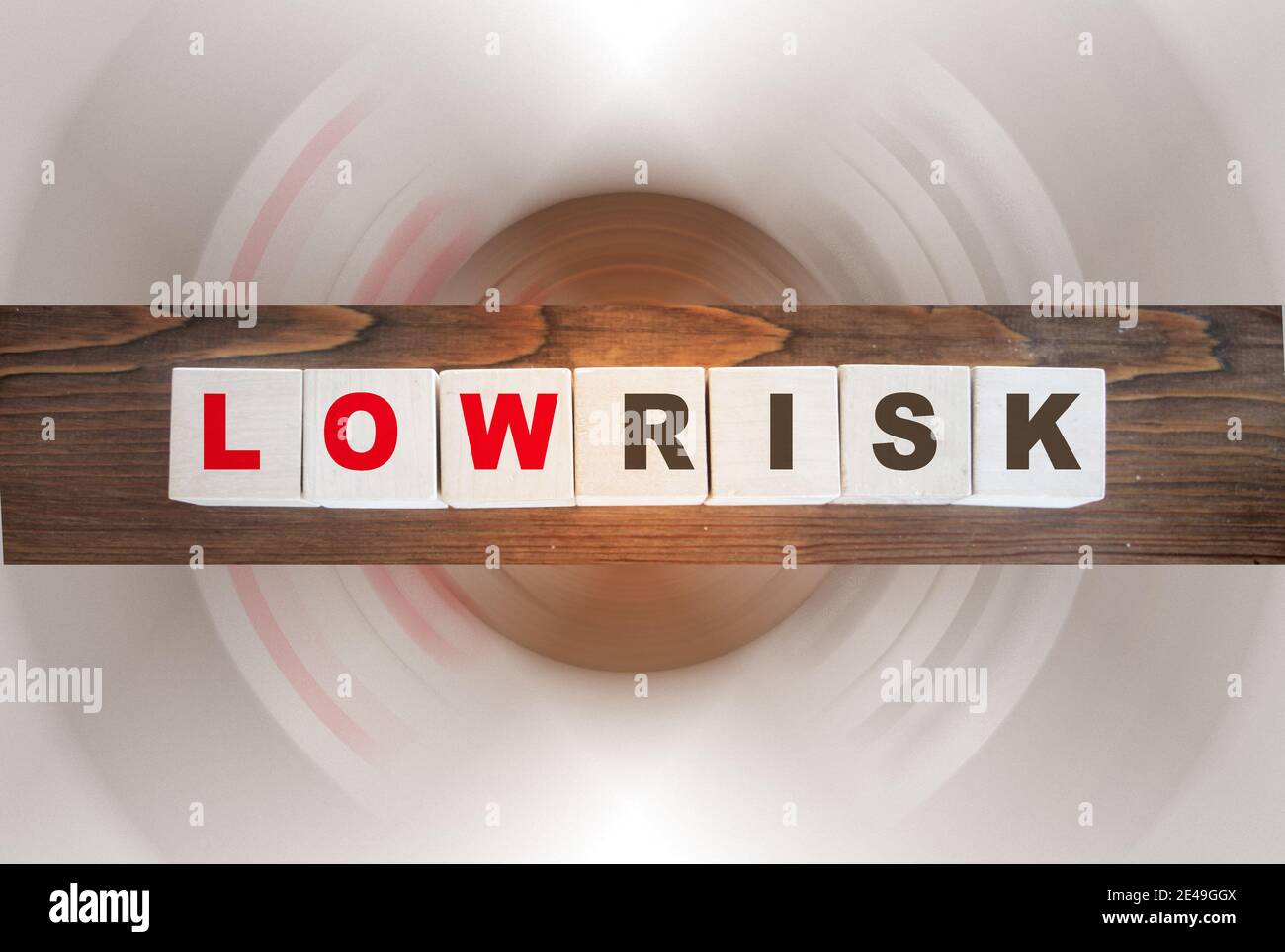Low risk words written on wooden cubes. Financial risk assessment, risk ...