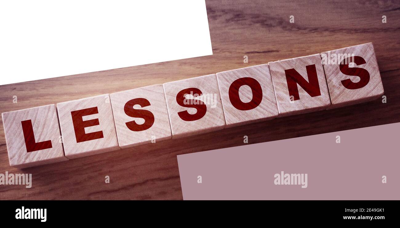 Lessons Word Written In Wooden Cubes. Learning concept Stock Photo - Alamy
