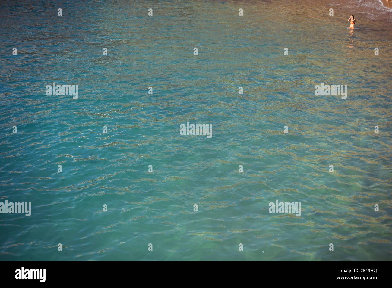 Woman getting water well hi-res stock photography and images - Alamy