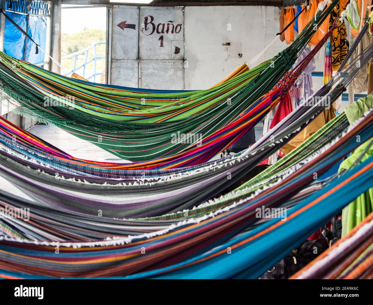 Amazon River, Peru. Beautiful, colorful hammocks on the cargo boat ...