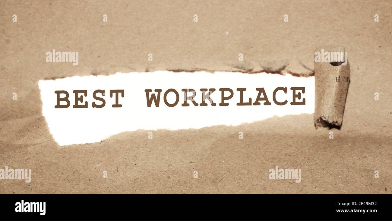 Best Workplace words appearing under brown torn paper. HR human ...