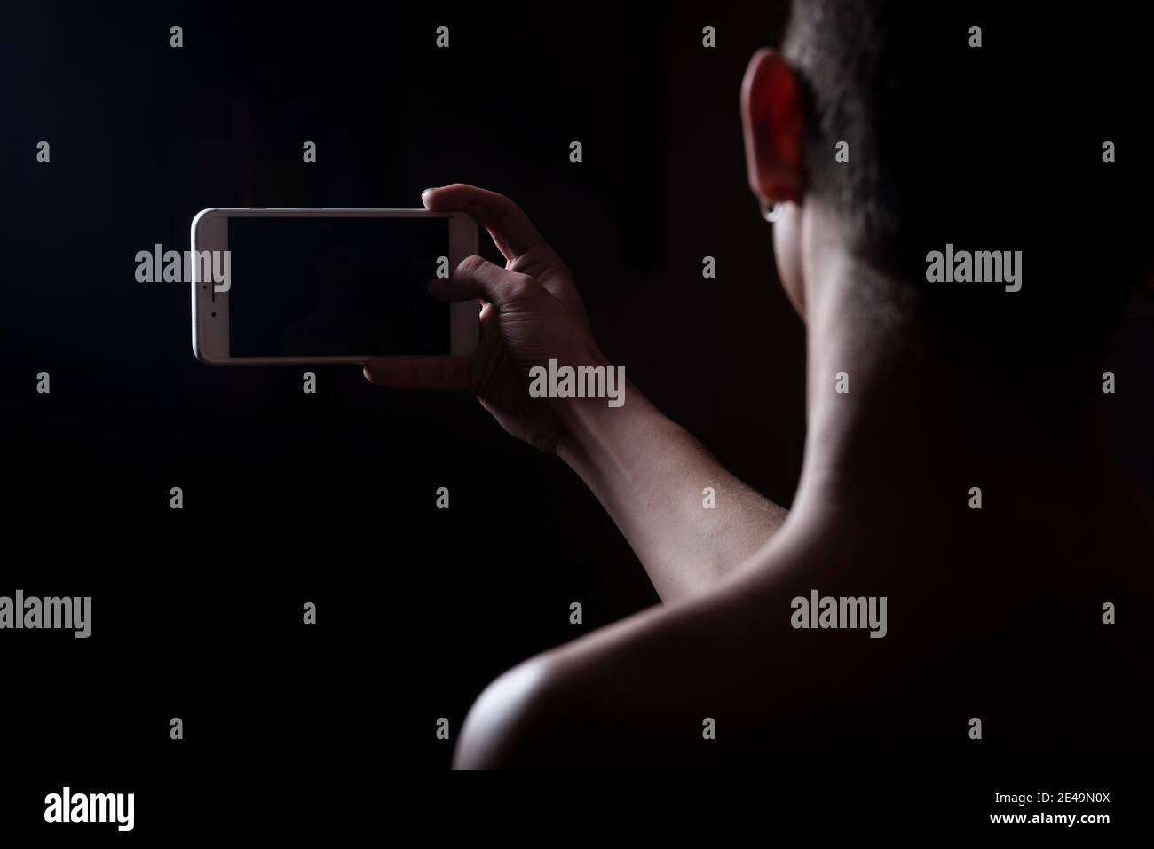 Self portrait in shadows hi-res stock photography and images - Alamy
