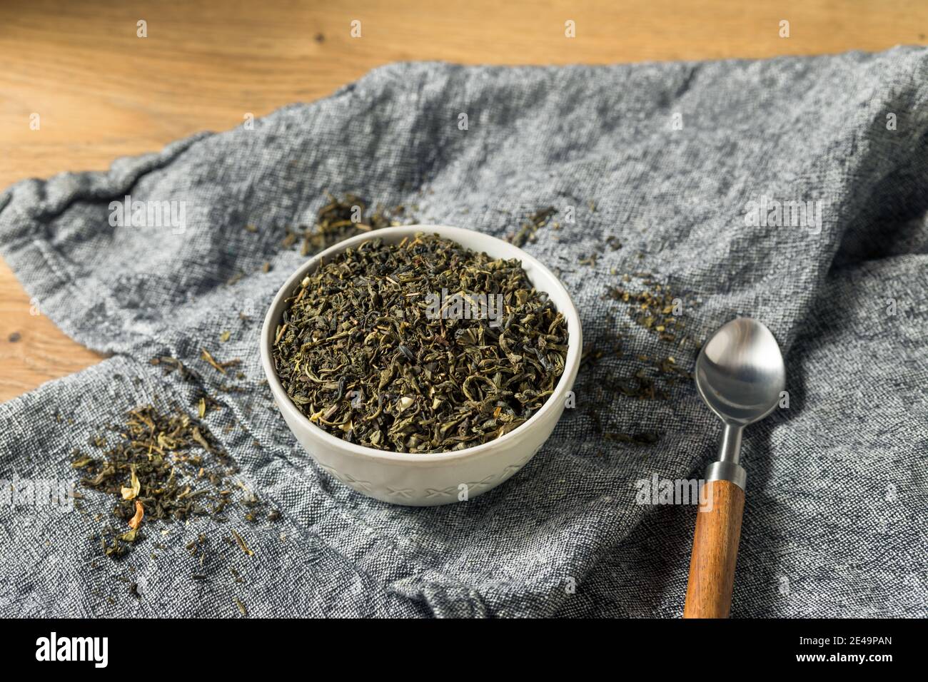 Dry Green Organic Tea Leaves in a Bowl Stock Photo - Alamy