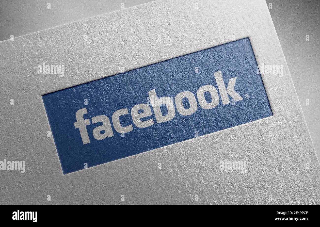 Facebook logo on paper texture illustration Stock Photo - Alamy