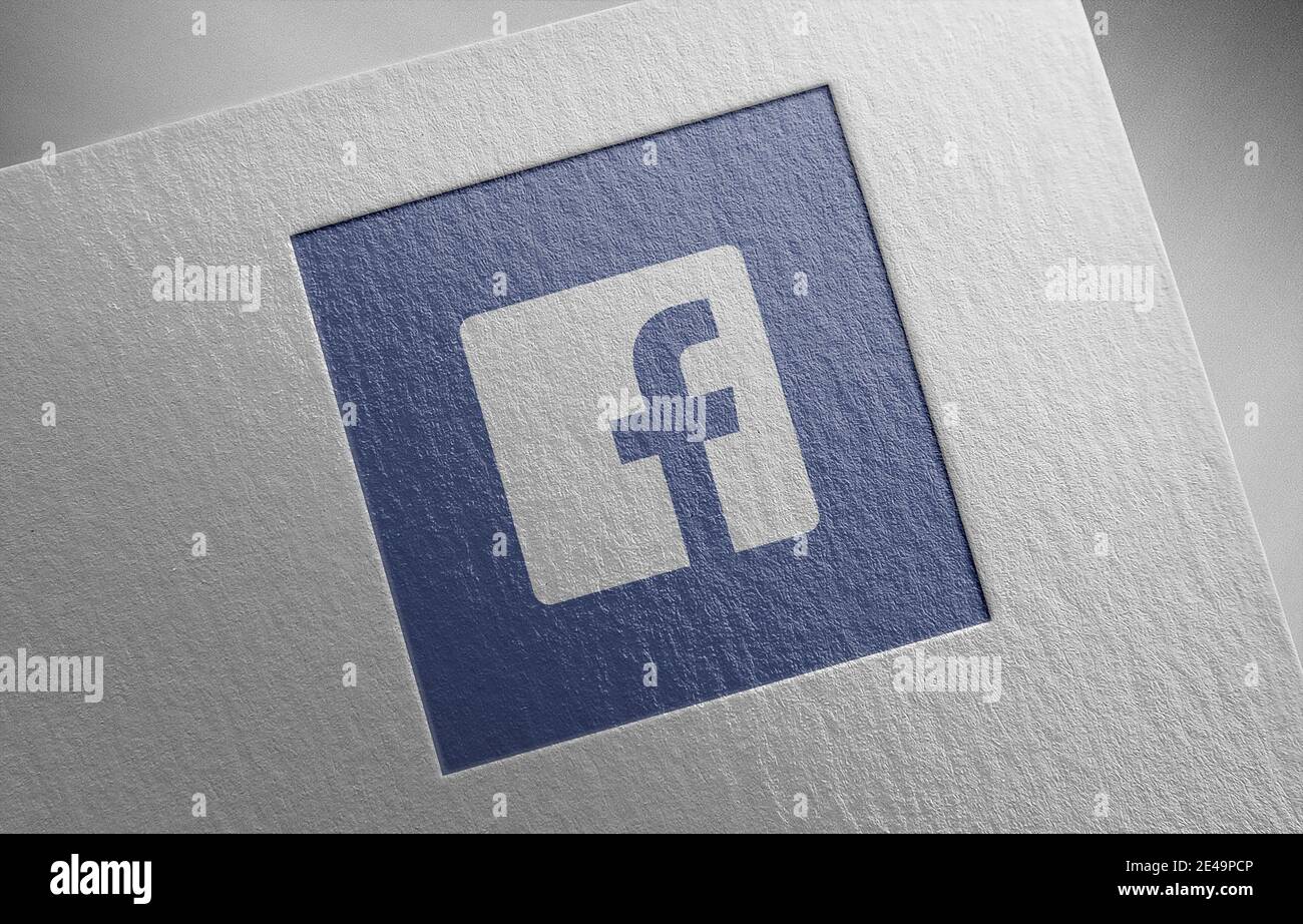 Facebook logo on paper texture illustration Stock Photo - Alamy