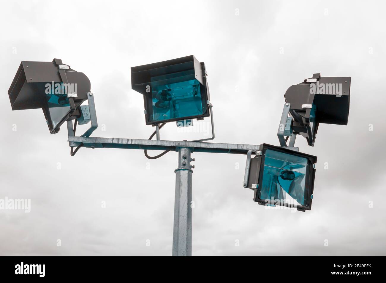 Aerial view of a 4 head sports field lighting structure on a white ...