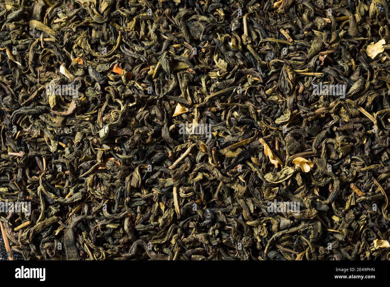 Dry Green Organic Tea Leaves in a Bowl Stock Photo - Alamy