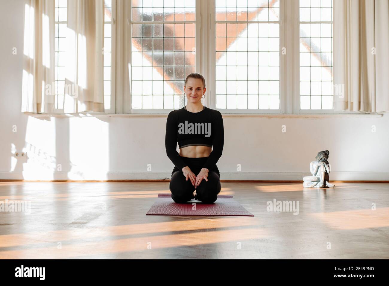 Yoga exercise rabbit - Shashankasana beginning of the exercise Stock ...