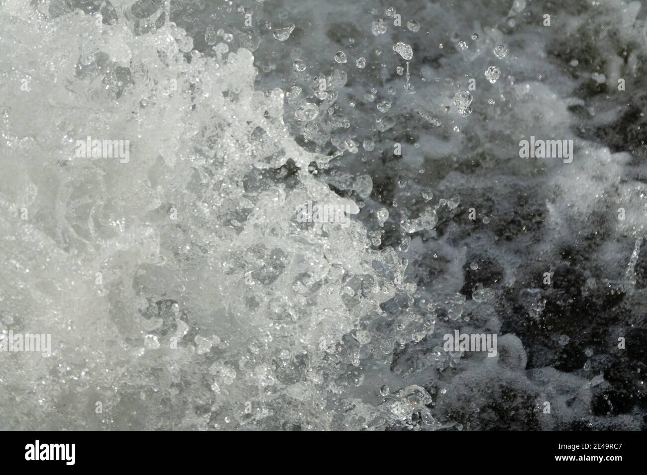 Water splashes from waterfall close-up. Beauty of clear spring water ...