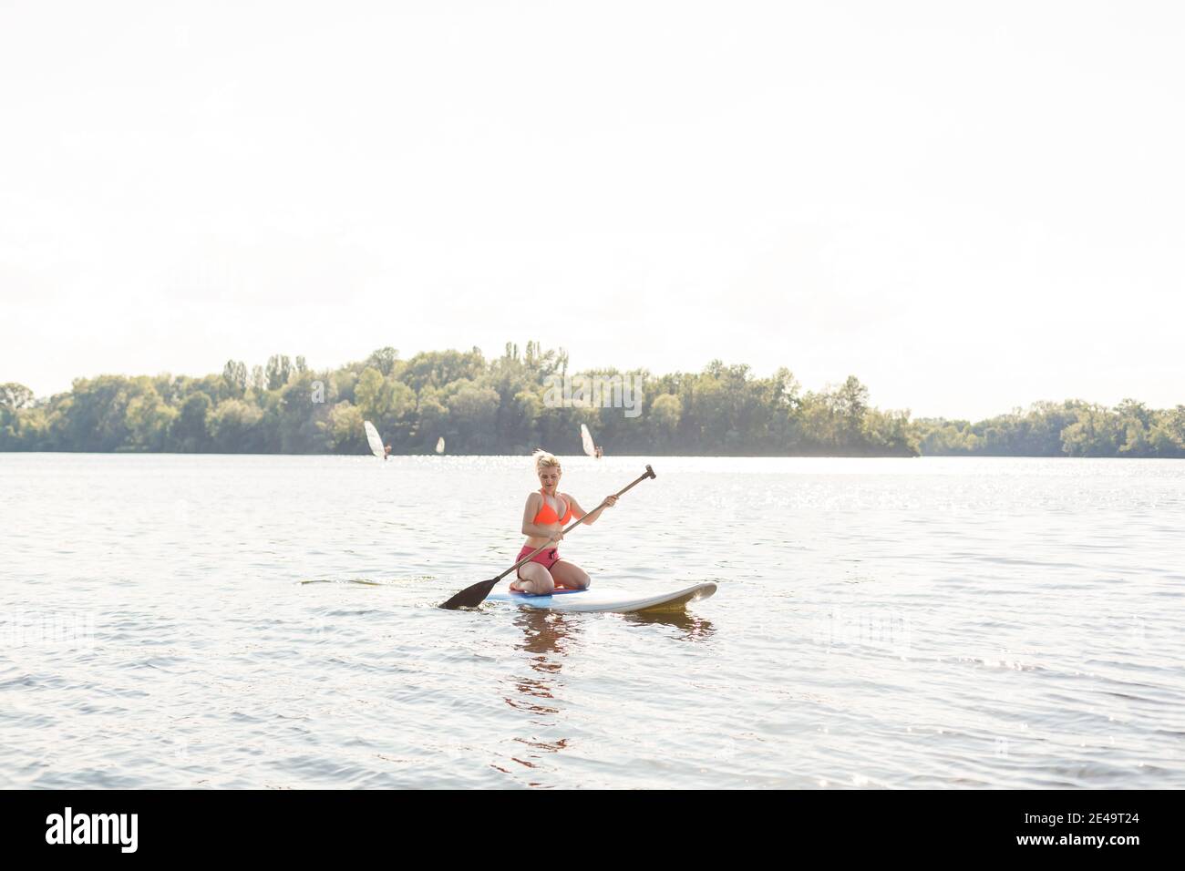 Exploring lake paddle board hi-res stock photography and images - Alamy