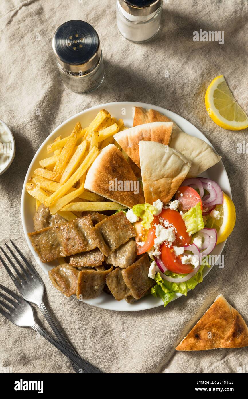 Homemade Greek Gyro Plate with Pita Fries and Tzatziki Sauce Stock ...