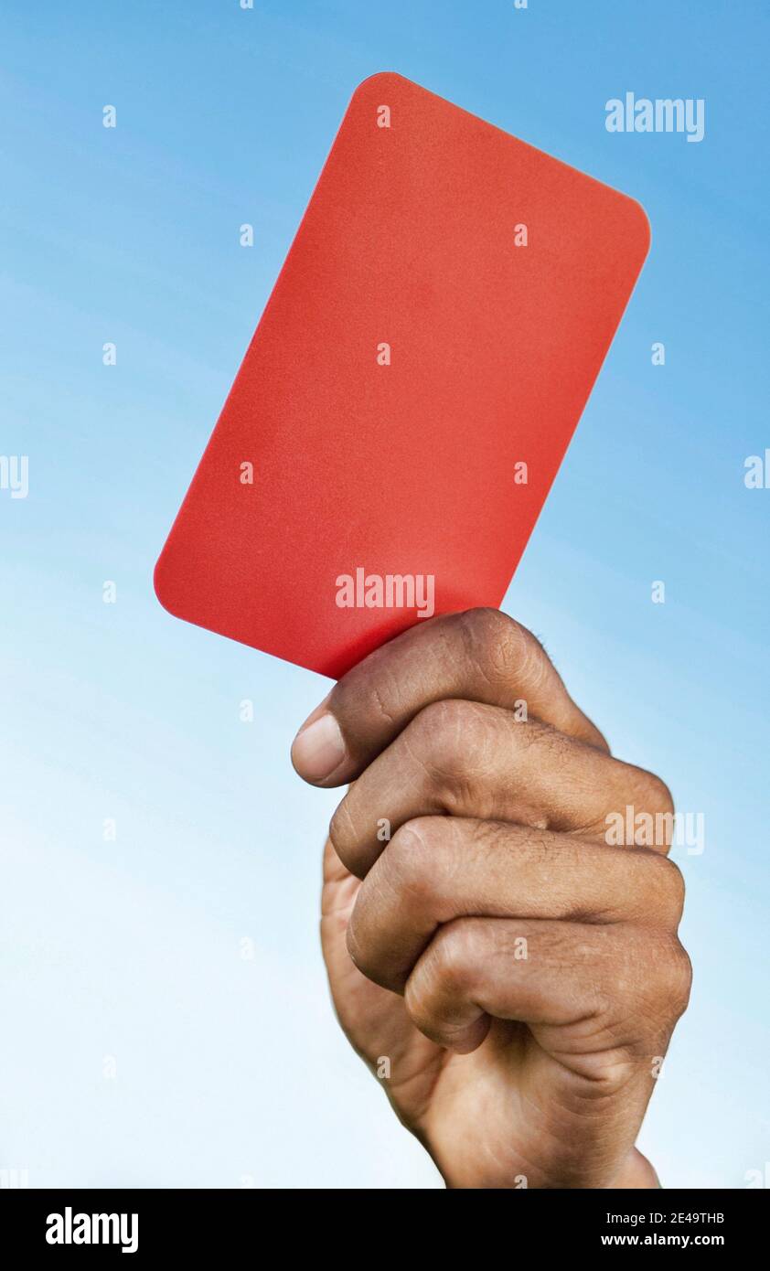 Soccer Referee Holding Out a Red Card Stock Photo - Alamy