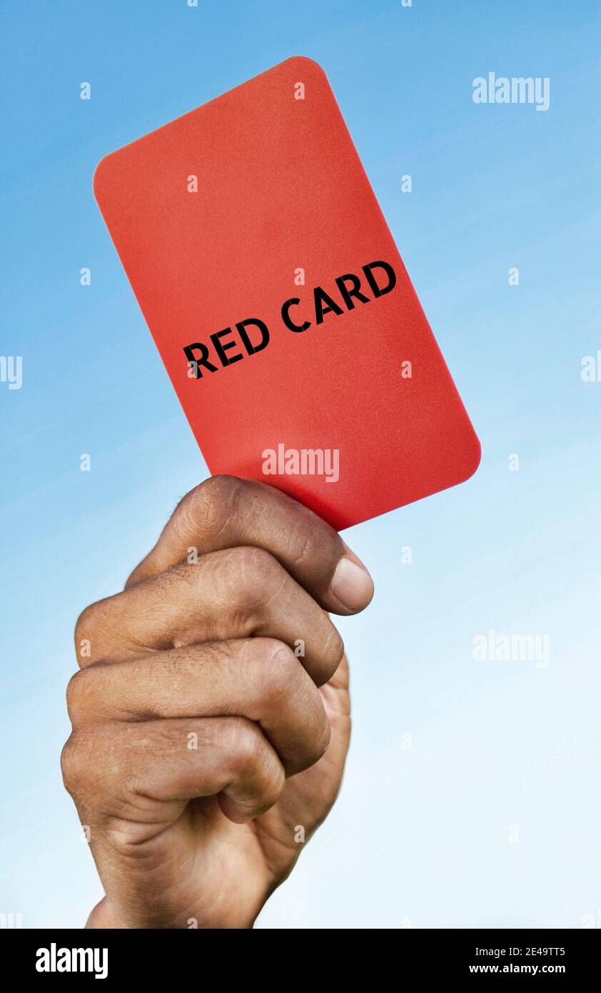 Soccer Referee Holding Out a Red Card Stock Photo - Alamy