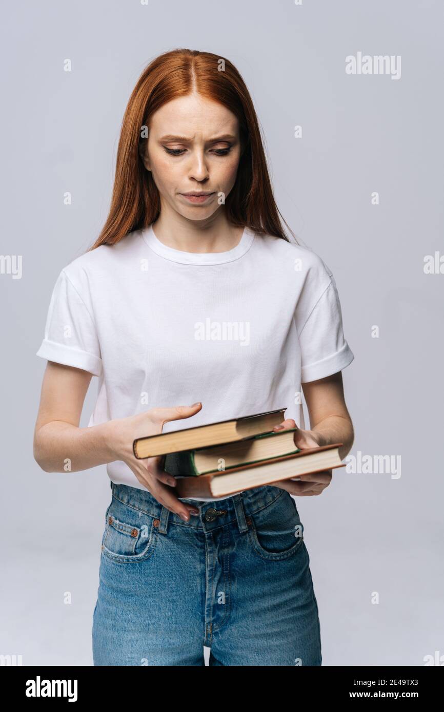 Person holding book unhappy hi-res stock photography and images - Alamy