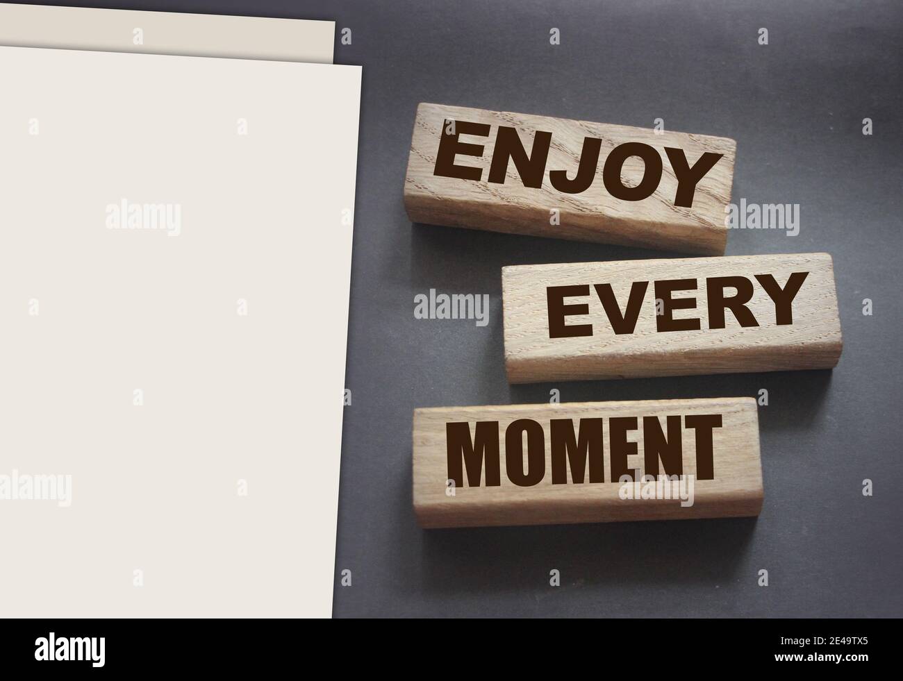 Enjoy Every Moment word written on wood block. Positive mindset ...