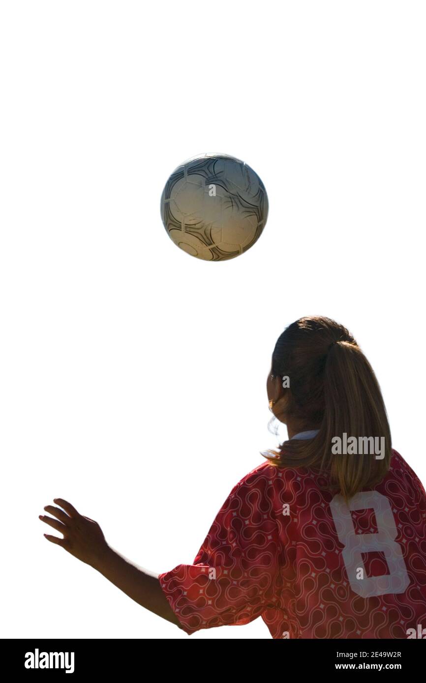 Teenage Girl Heading Soccer Ball Stock Photo - Alamy