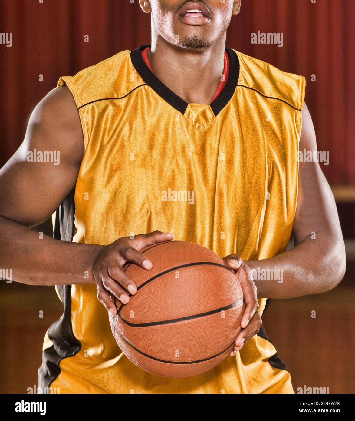 Portrait of Basketball Player shooting ball for 3 points Stock Photo ...