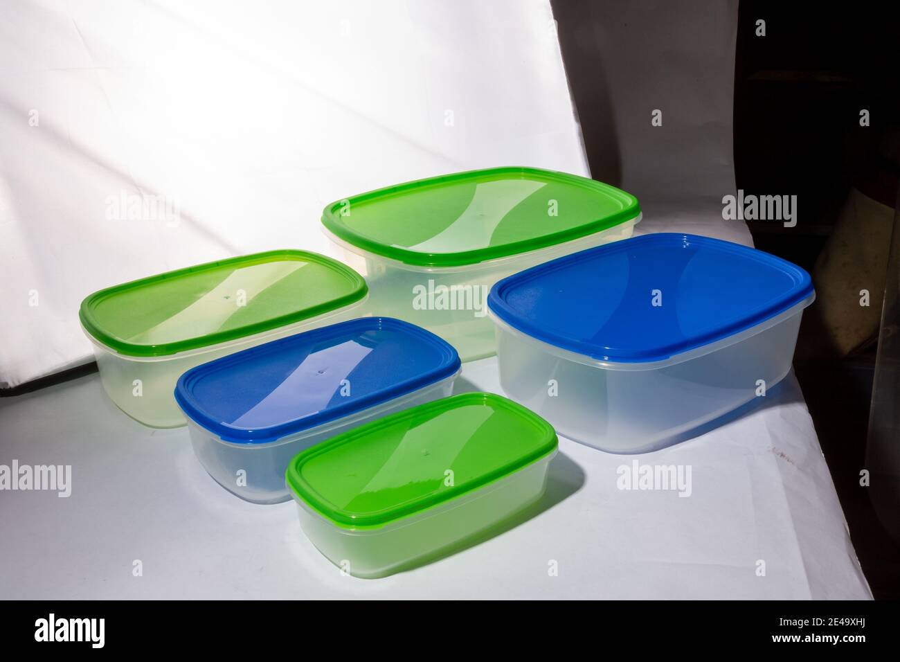 et of plastic food containers of various volume with colored lids and ...