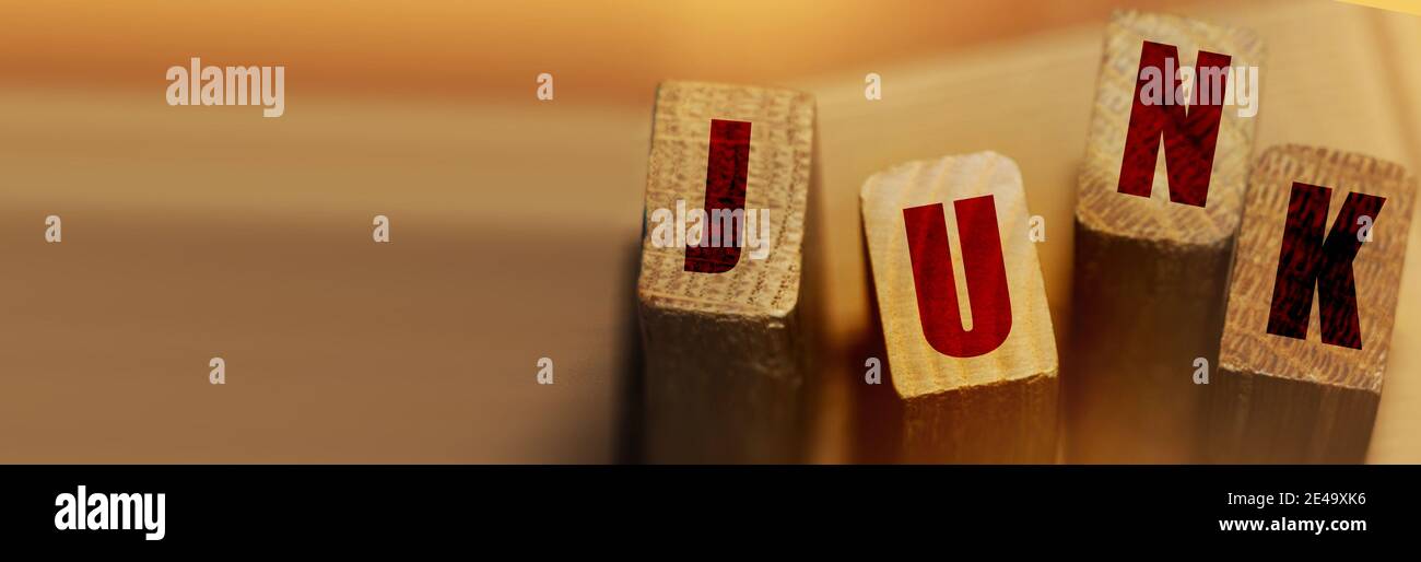 Junk text from wooden blocks on desk. Junk food oncept Stock Photo - Alamy
