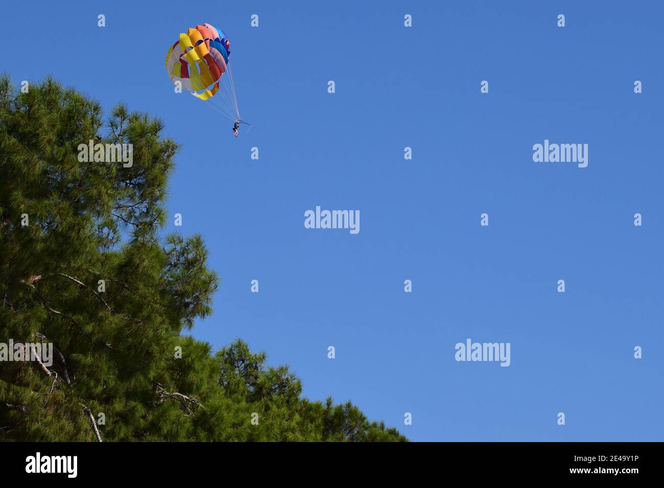 Recreational parakiting background - silhouetes of man under ...