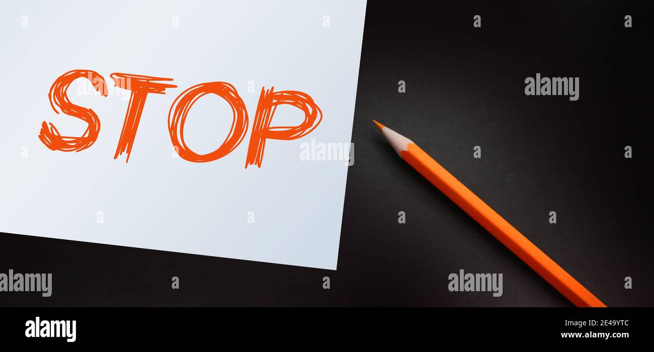 Stop sign with orange pencil. Business, social and healthcare concept ...