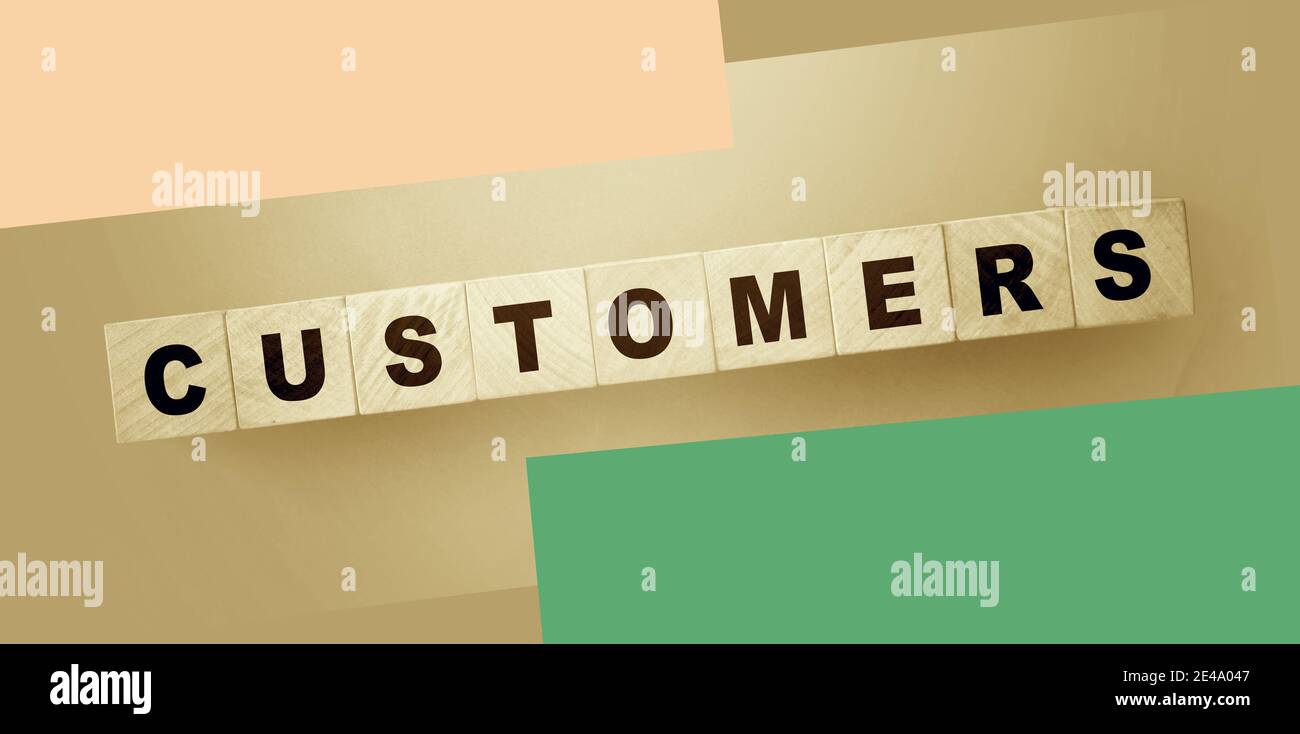 Customers word on wooden blockson green gradient background. B2C ...