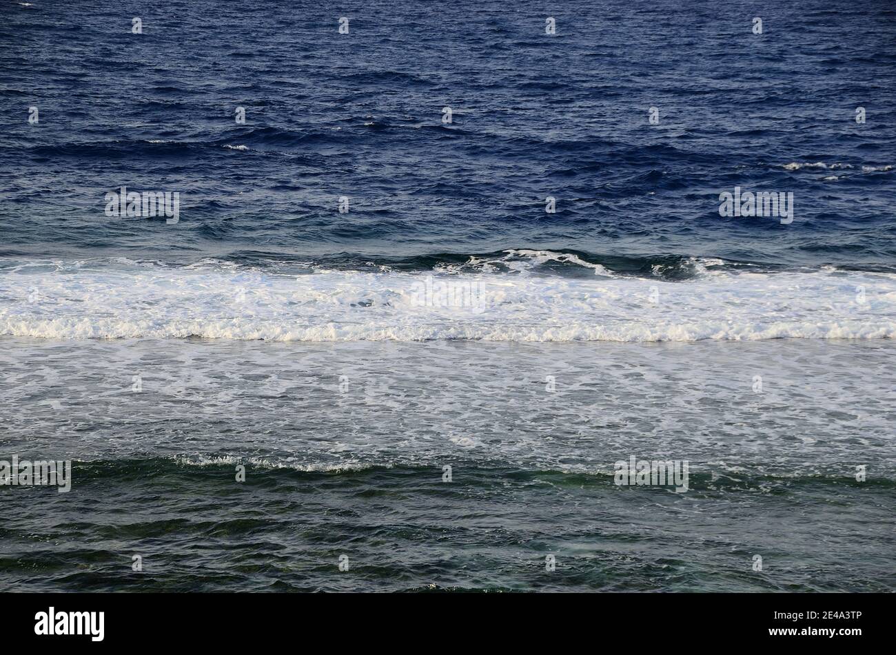 low smooth waves in the ocean beach Stock Photo - Alamy