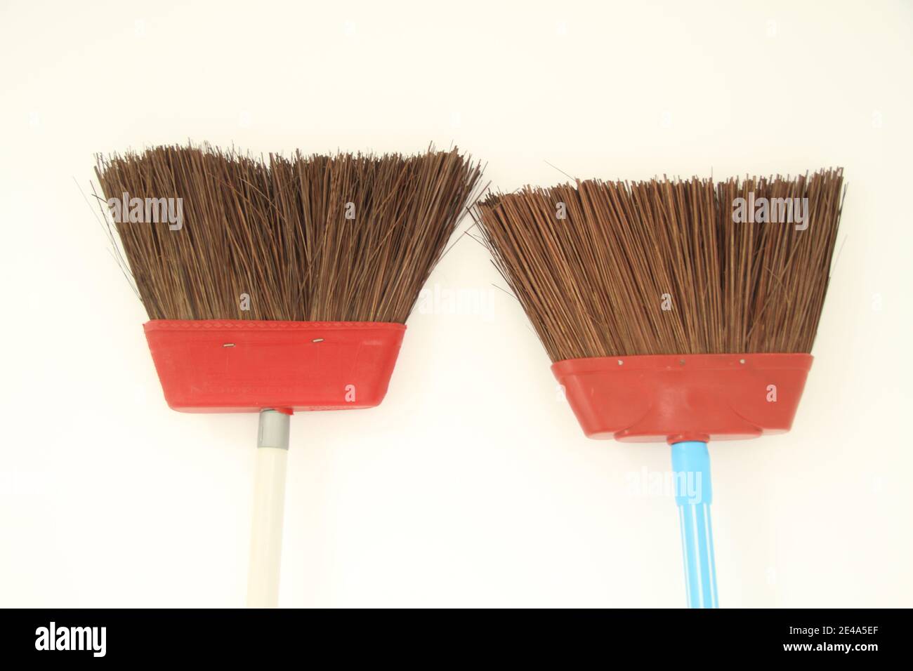 Piassava, piaçava broom with long wooden handle isolated on white ...