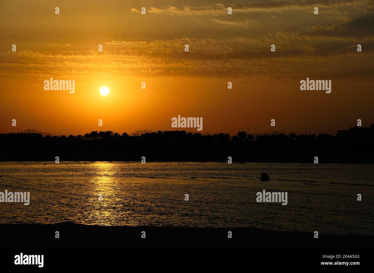 Warm sunset in seaside holiday Stock Photo - Alamy