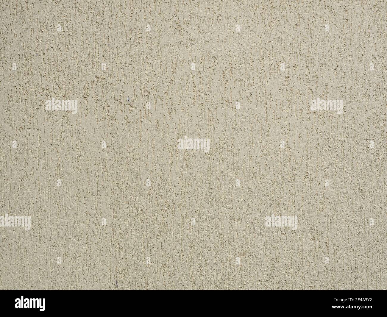 Beige wall with decorative plaster with patterned scratches. Texture ...