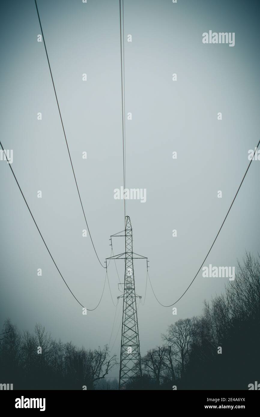 High-voltage power transmission line pylon with power cables Stock ...