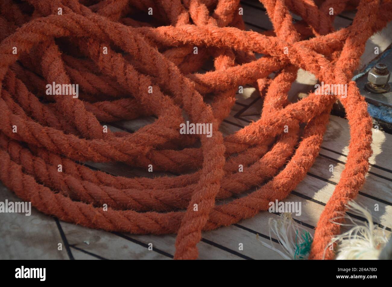 thick red rope on a ship Stock Photo - Alamy