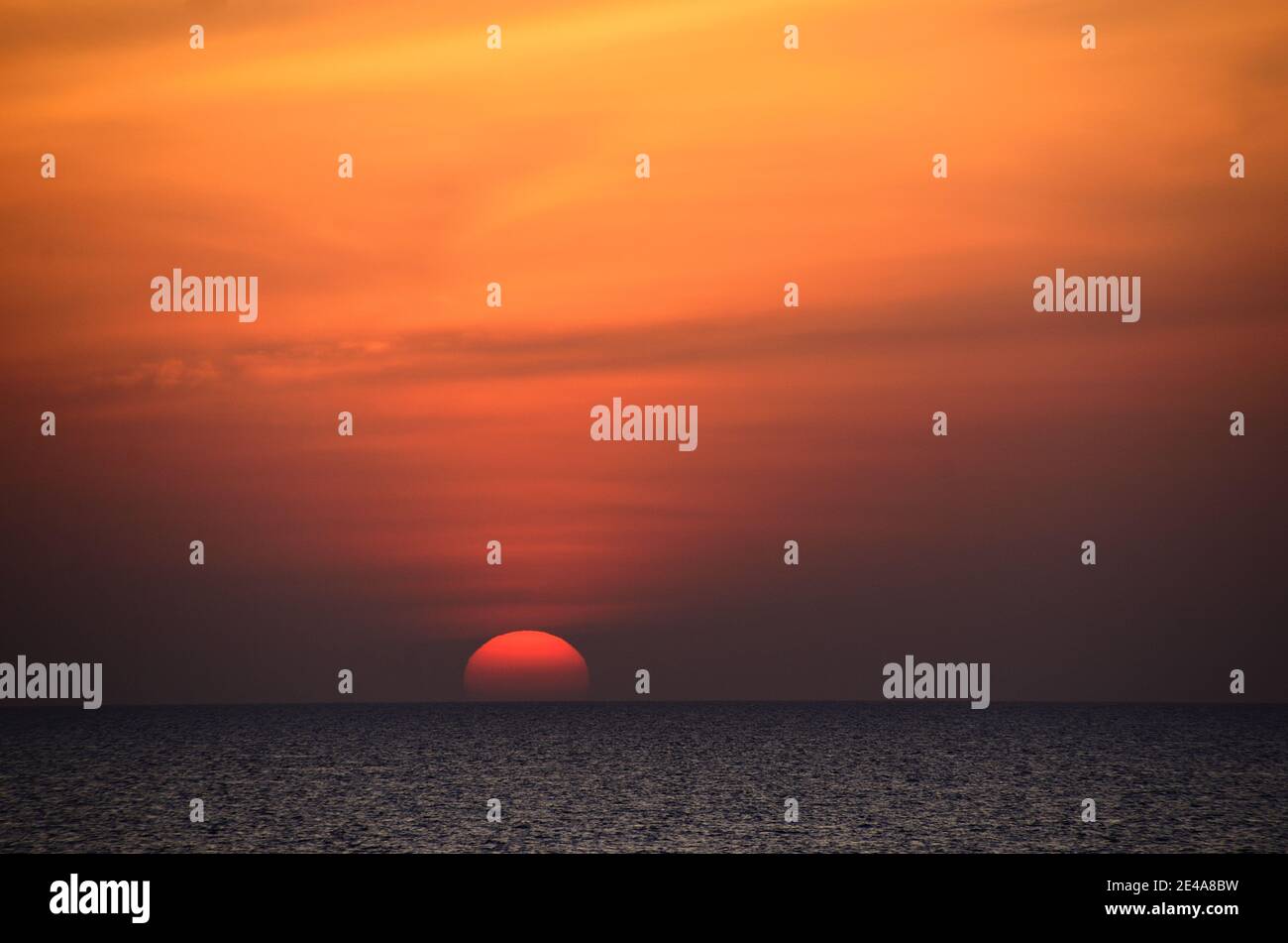 big sun with horizon seaside Stock Photo - Alamy