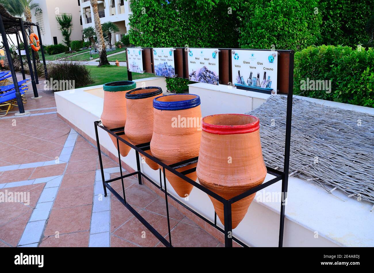 colorful different dustbin clay in hotel Stock Photo - Alamy