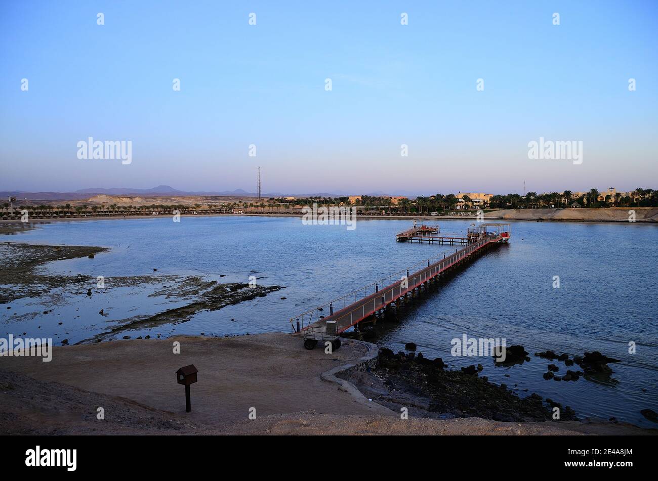 beach and dock in Egypt by sunrise Stock Photo - Alamy
