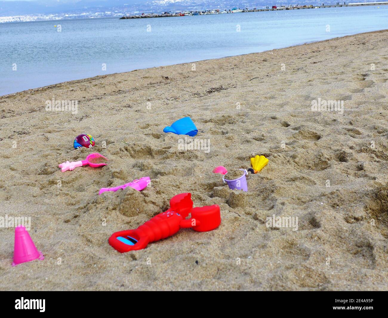 toys on sand beach Stock Photo - Alamy