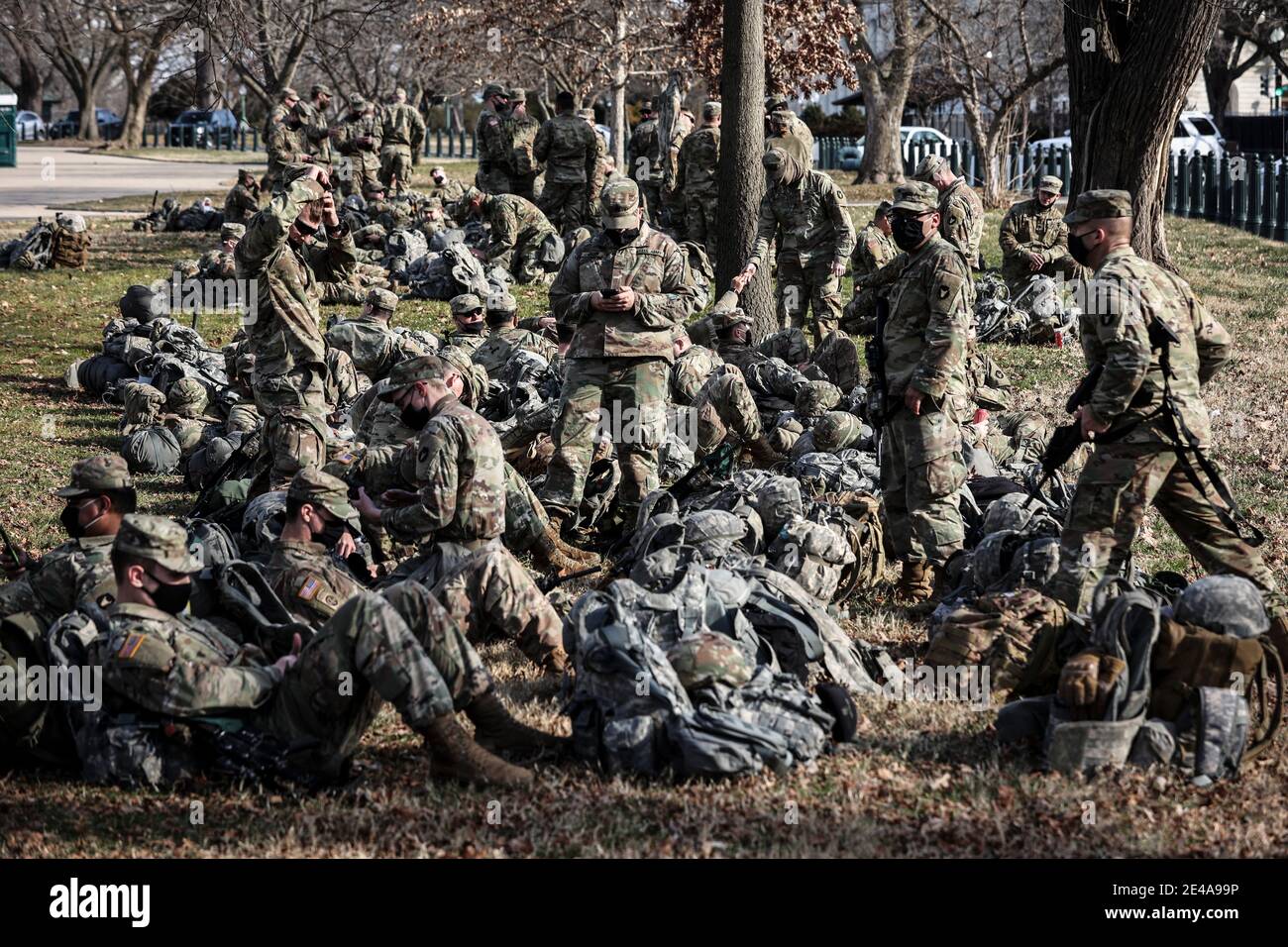Members of the National Guard take a rest outside of the U.S. Capitol ...