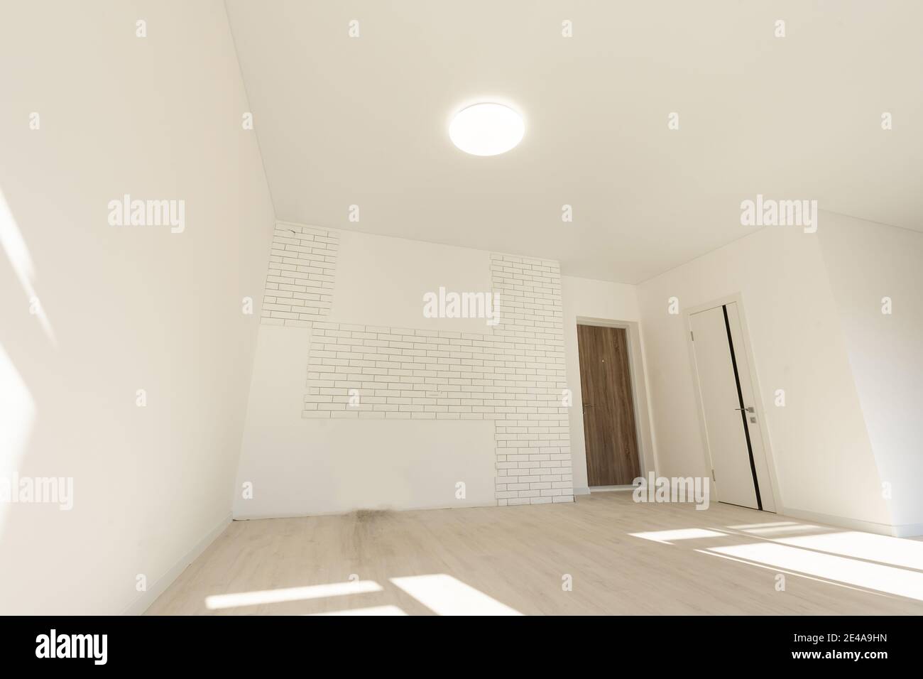 New empty small room in renovated home Stock Photo - Alamy