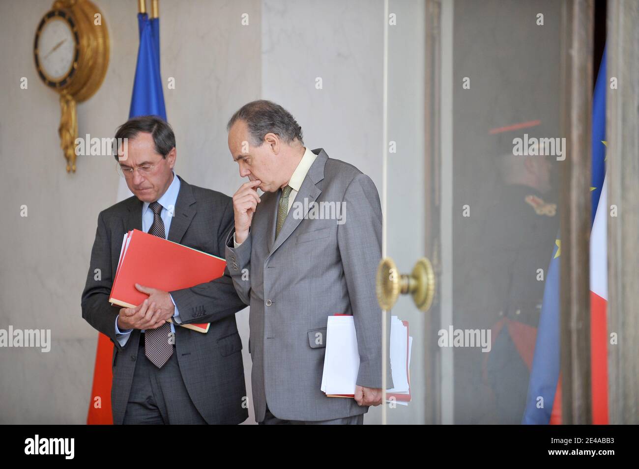 Secretary-general of the Elysee Palace Claude Gueant speaks with French ...